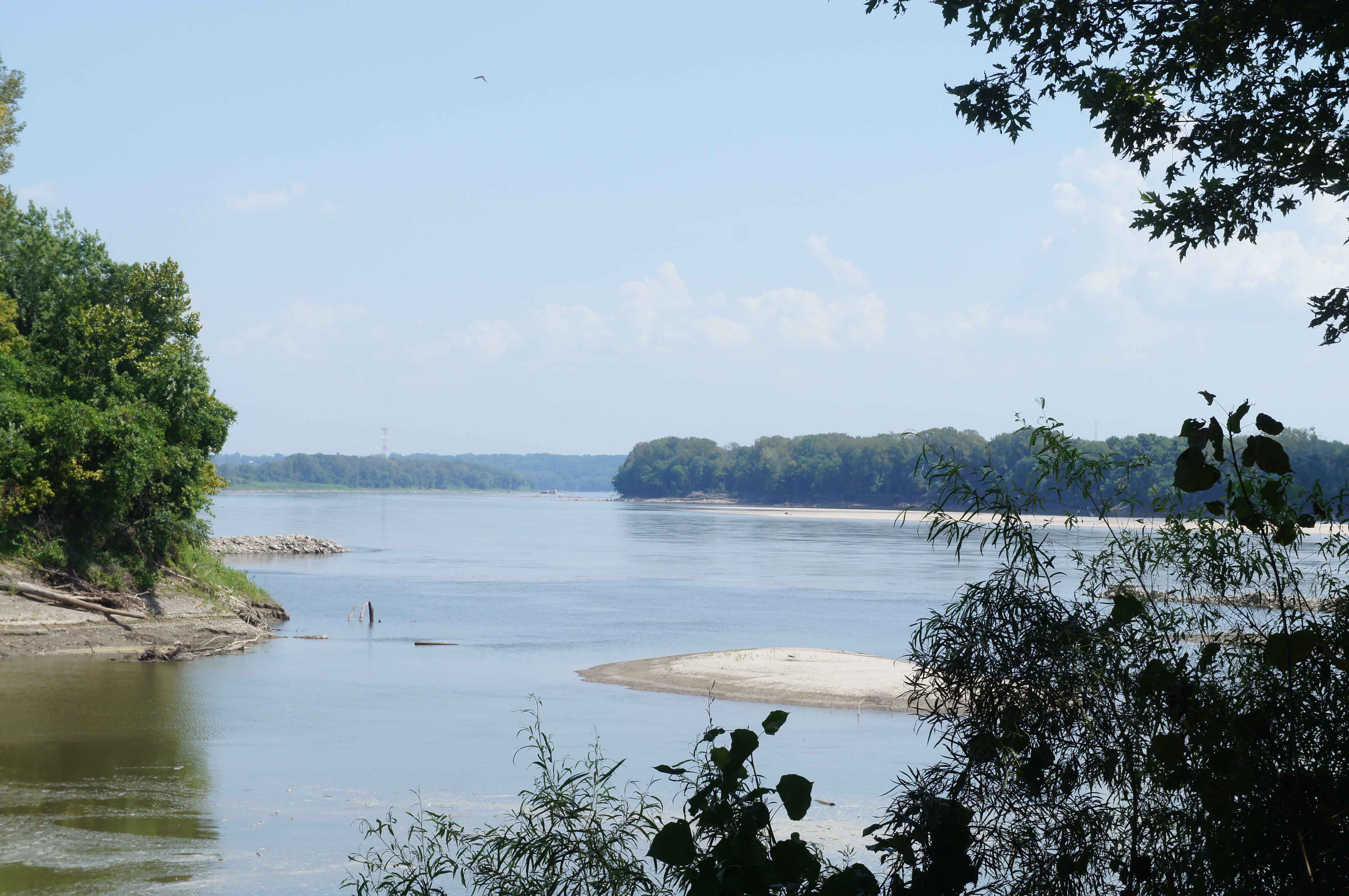 Finally, the trail exits the cornfields and squeezes up to the Missouri ...